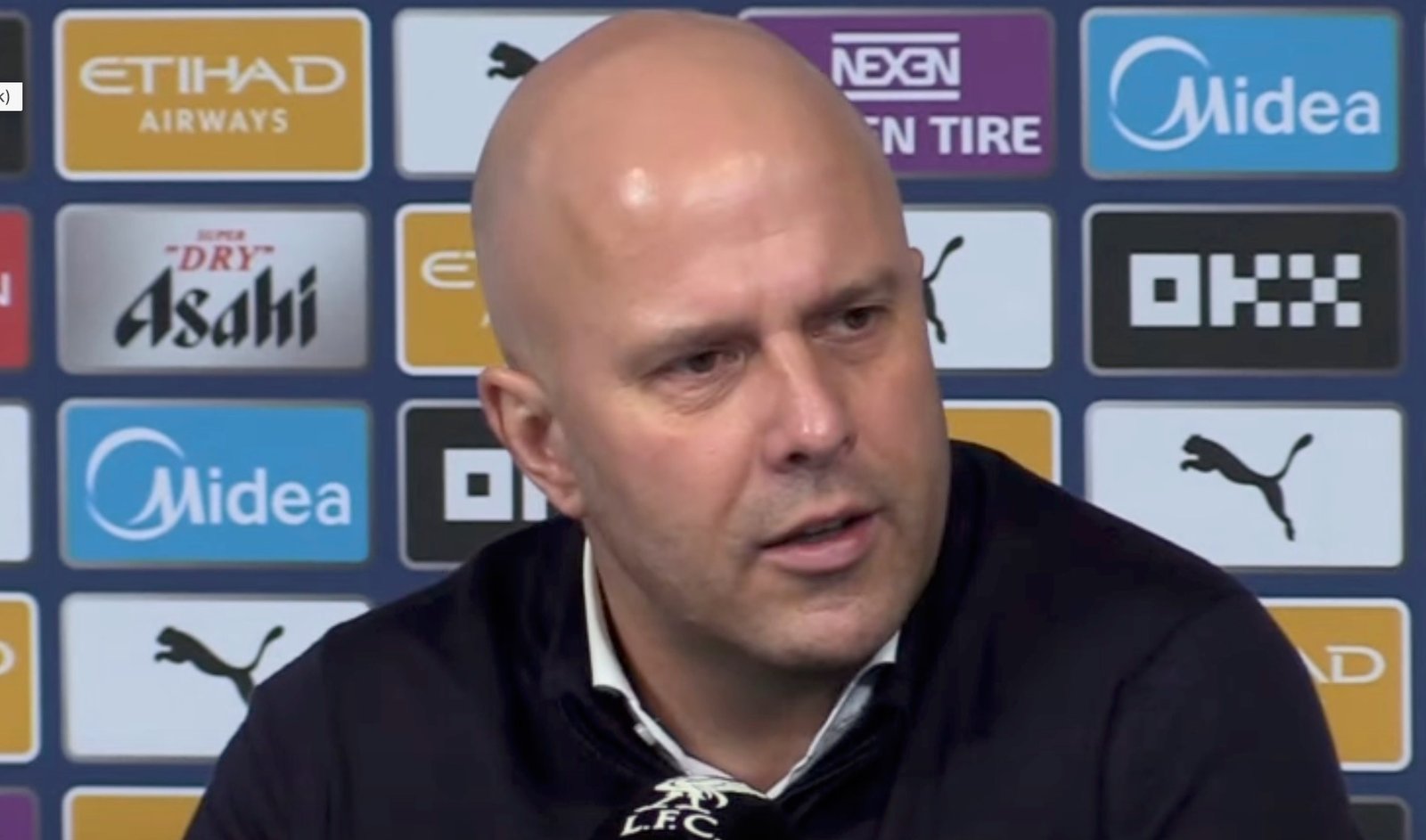 Arne Slot reacts to Liverpool's victory at Man City